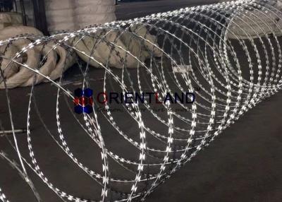 China Stainless Steel Concertina Coil Fencing Security Barbed Wire 56 Loops 450mm for sale