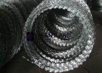 China 450mm NATO Coiled HDG BTO-11 Stainless Steel Razor Wire 56 Loops 8-9m for sale