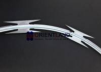 China CBT 65 Concertina L Type Razor Barbed Wire 65mm Blade 100mm Spacing 14-16m Length for sale