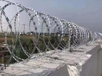 China Concertina Razor Wire BTO 22 Barbed Tape - 22mm Blade Width, 2.5mm Core Wire, 450-1500mm Coil Diameter for sale