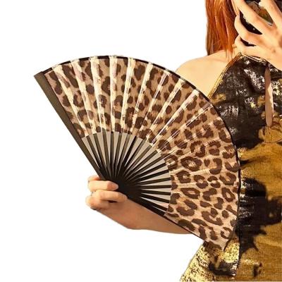 China 2024 New Arrival Premium 23cm Bamboo Hand Fan Folk Art Carved Flower Design Portable Sanyata for April Fool's Day for sale
