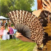 China 2024 New Arrival Premium 23cm Bamboo Hand Fan Folk Art Carved Flower Design Portable Sanyata for April Fool's Day for sale