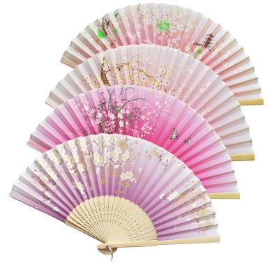 China Hot Selling Carved Bamboo Folding Silk Material Wedding Fans for Gifts for sale