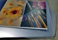 China Transparent Glossy 1.0mm PVC Coated Overlay for Bank Cards Vicat 72±2°C Heating Shrinkage ≤10% for sale