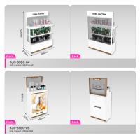 China Skincare Display Stand Platinum Wooden Central Hall Cabinet With Light Box For Space-Saving Store Design And Multi-Functional Store Furniture for sale