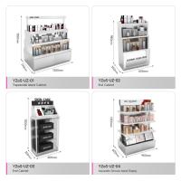 China Cosmetic Display Shelf Facial Mask Wall Cabinet With Light-box For Skincare Shop Interior Design for sale