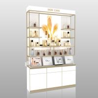 China Cosmetic Display Cabinet White Wooden Skincare Cabinet With Light Box For Branded Shop Decoration And Premium Display Rack for sale