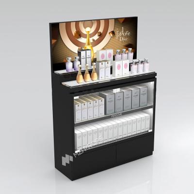 China Customized Perfume Display Cabinet Black Wooden Makeup Display Furniture with Lightbox for Cosmetic Store Interior Design for sale