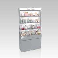 China Gray Wooden Display Cabinet Multilayer Store Rack With Light-box For Skincare Store Design for sale