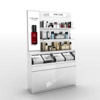 China Silver Gray Skincare Display Cabinet Stainless Steel Multi-layer Rack For Retail Shop Interior Design for sale