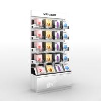 China Cosmetic Display Shelf Facial Mask Wall Cabinet With Light-box For Skincare Shop Interior Design for sale