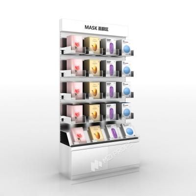 China Cosmetic Display Shelf Facial Mask Wall Cabinet With Light-box For Skincare Shop Interior Design for sale