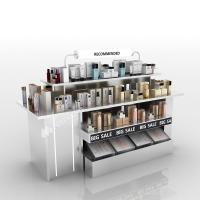 China High Quality Cosmetics Store Display Rack Premium Stainless Steel Promotion Cabinet With White Organic Light Tube For Retail Store Design for sale