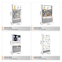 China Makeup Display Counter Grey Oil Board Pendant With Light Box On The Back Cabinet For Cost-Effective Store Table And Luxury Display Shelf for sale