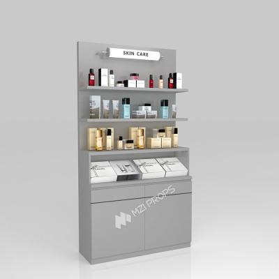 China Perfume Display Rack Grey Wooden Counter For Retail Shop Display Furniture And Branding Shop Table for sale