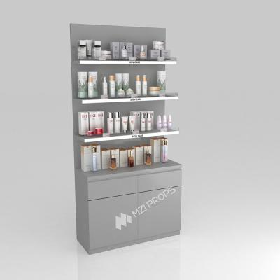 China Makeup Display Stand Grey Wooden Simple Counter For Fashion-Forward Store Decoration And Compact Shop Stand for sale