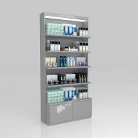 China Retail Display Shelf Grey Wooden Counter, Stylish And Simple, With Hidden Led Lights Inside For Branding Display Shelf And Trendy Display Rack for sale