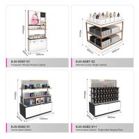 China Cosmetic Shop Rack Platinum Wooden Central Hall Cabinet With Light Box For Perfume Shop Display Stand And Branding Store Fixtures for sale