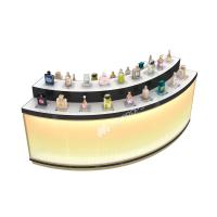 China Perfume Store Rack Curved Boutique Display Platform for Beauty Display Cabinet and Skincare Shop Interior Design for sale