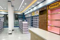 China 02-DYJYS002 Customized Shop Design Pharmacy Counter Table Wooden Pharmacy Shelves for Durable Display Showcase for sale