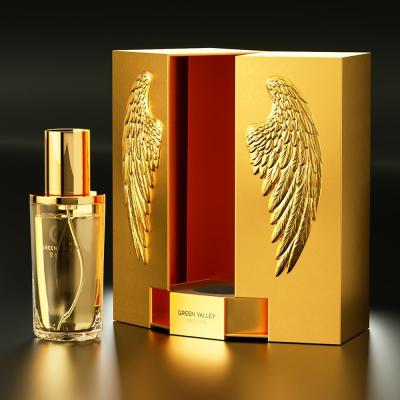 China Luxury Gold Double Door Perfume Gift Box 3D Angel Wing Embossed Perfume Packaging Wholesale for sale