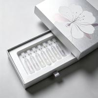 China Custom Silver Sakura Print Cosmetic Gift Box with 7 Ampoule Bottle Insert for Skincare Packaging Box for sale