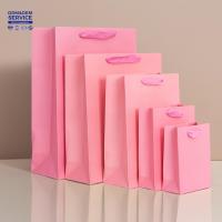 China Kraft Paper Handbag Gift Bag Wholesale Garment Printing Advertising Bag Customize Paper Bag with logo for sale