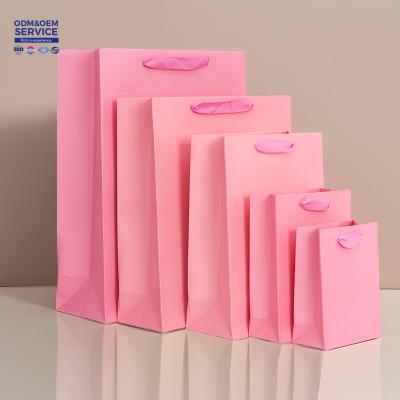 China Kraft Paper Handbag Gift Bag Wholesale Garment Printing Advertising Bag Customize Paper Bag with logo for sale
