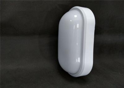 China 1000lm 12W IP65 White Oval Bulkhead Lamp / LED Outdoor Bulkhead Lights for sale