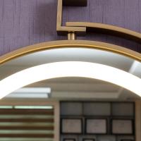 China Transform Your Bathroom with Golden Framed LED Lighted Round Wall Mirror for sale