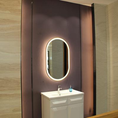 China Stainless Steel Oval Framed Wall Mirror with LED Light Luxury Golden Color W60xH100cm for sale