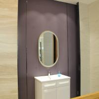 China Stainless Steel Oval Framed Wall Mirror with LED Light Luxury Golden Color W60xH100cm for sale