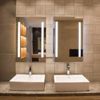 China Customized Design Style LED Lighted Bathroom Mirror with Clock and Medicine Cabinet for sale