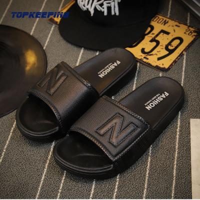 China Custom Logo Mens Rubber Flip Flop Black White Footwear for sale