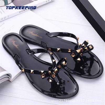 China PVC Summer Black Flat Sandals Womens With Bow Rivet for sale