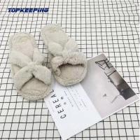 China Anti Slip EVA Sole Womens Fuzzy Slipper With Grid Bottom for sale