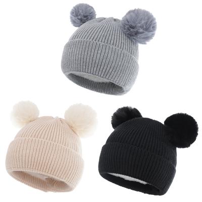 China Wholesale COMMON Fleece Striped Thicken Winter Hat Kids 100% Cotton Knitted Faux Fur Pom Pom Beanies Toddle Baby Hats Double for sale