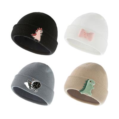 China COMMON Casual Skullies Solid Color Winter Hat Sticky Logo Wool Slouchy Warm Hat Skully Cold Knitting Cap For Kids for sale