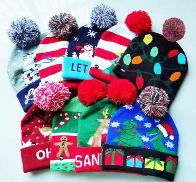China COMMON Winter Festival Christmas Party Pompom Led Hats Kids Led Sparkle Hats Men Women Led Christmas Knitted Beanies Hat for sale