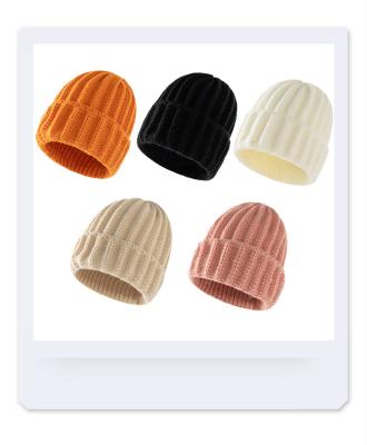 China COMMON Solid Color Wholesale Custom Knitted Knitted Hats Embroidered Warm Beanie Women Logo Men's Winter Cap for sale