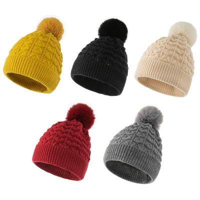 China 2021 Warm Fashion Winter Hat JOINT Knit Skullies Knitted Winter Hat Pom Pom Skully Ski Hats For Adults Women Men for sale