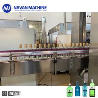 China Automatic Glass Bottle Non Gas Liquid Vodka 3 In 1 Filling Machine for sale
