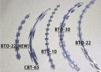 China Hot Dipped Galvanized Steel 2mm Razor Barbed Wire Coil - 450mm to 960mm Diameter, 9M to 17M Length for sale