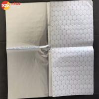 China Burger Foil Hexagon Honeycomb Paper Laminated Aluminum Foil Burger Wrapping for sale