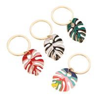 China Custom Logo Monstera Leaf Zinc Alloy Keychain with Enamel Green Plant Girl Design - 2D Gold-Plated Souvenir for sale
