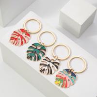 China Custom Logo Monstera Leaf Zinc Alloy Keychain with Enamel Green Plant Girl Design - 2D Gold-Plated Souvenir for sale