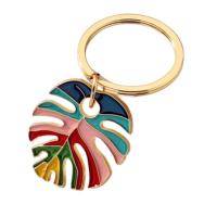 China Custom Logo Monstera Leaf Zinc Alloy Keychain with Enamel Green Plant Girl Design - 2D Gold-Plated Souvenir for sale
