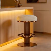 China Rose Gold Luxury Swivel Bar Stool Counter Height Stool With Padded Fabric Seat for sale