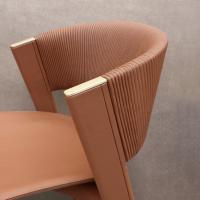 China Luxury Italian Style Curved Back Dining Chair with Modern Upholstered Accent Design for sale