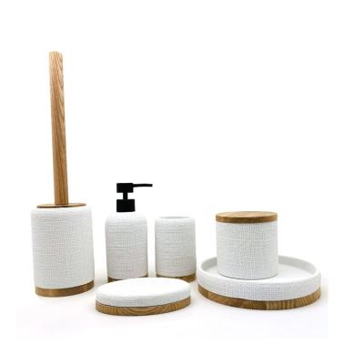 China Wooden Base Polyresin Bathroom Accessories Sets With Fabric Look for sale